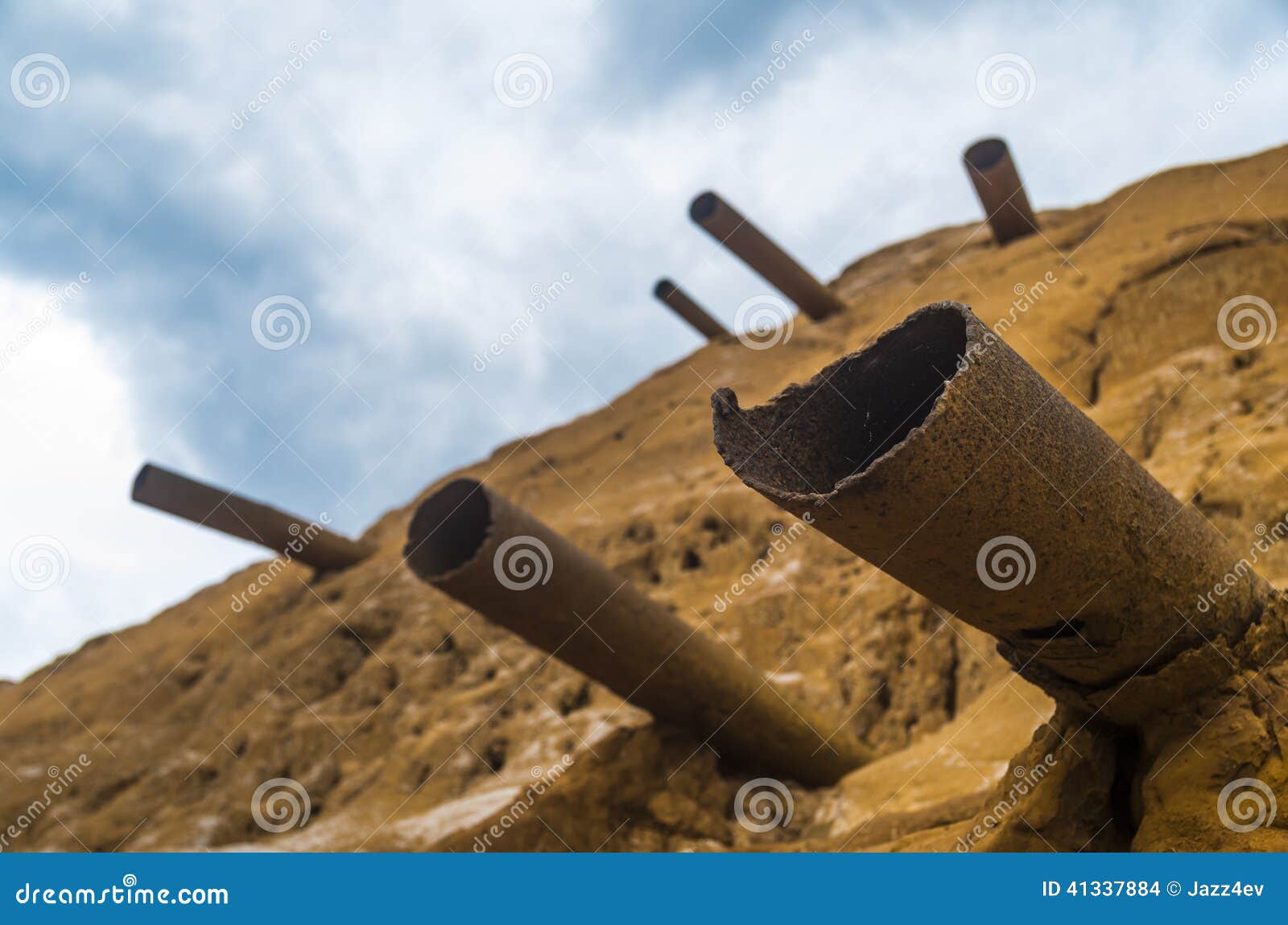 Huge Pile of Mining Waste and Rusty Metal Pipes Stock Photo - Image of ...