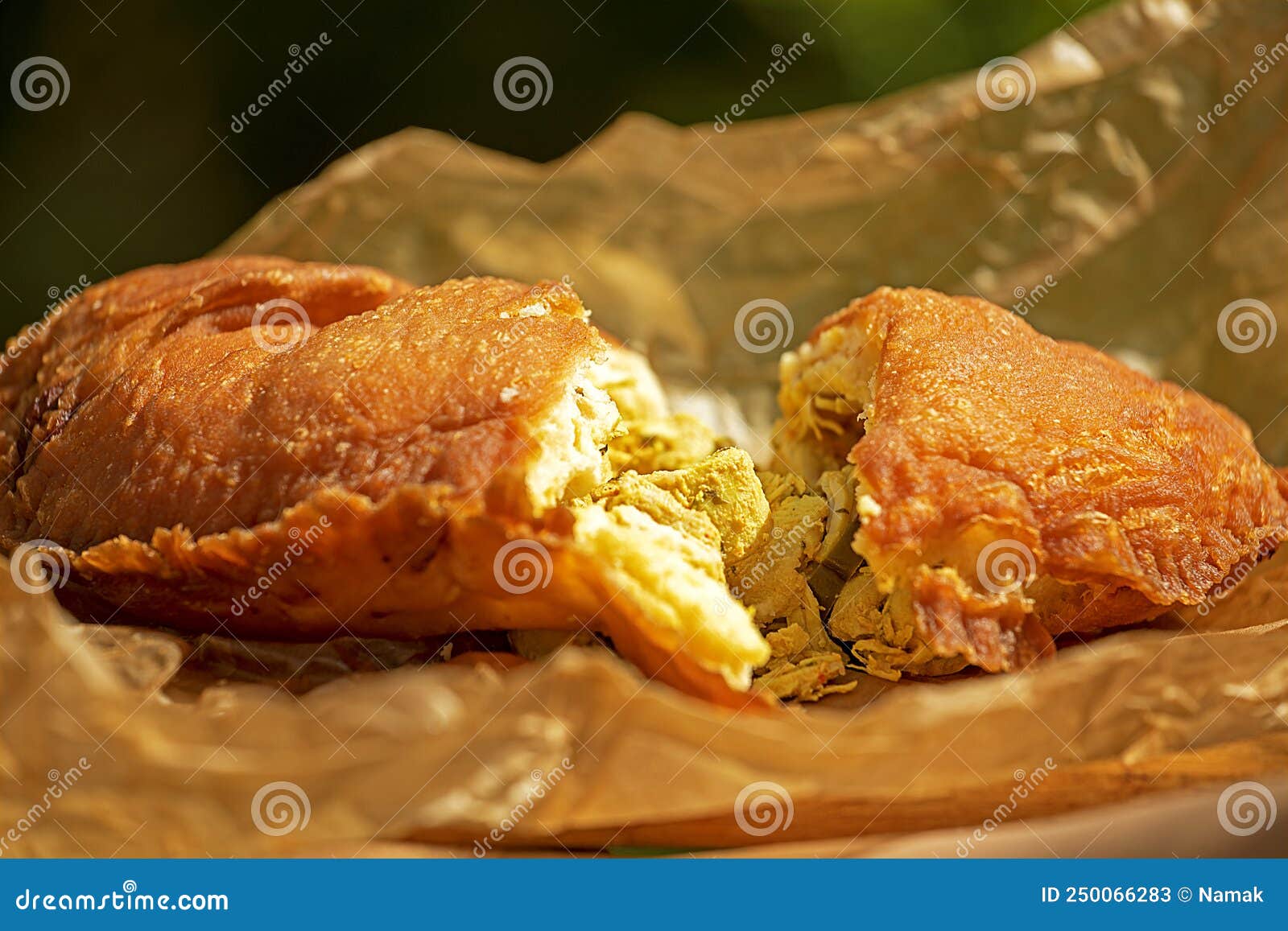 Huge Polish Chicken Curry Pies Broken into Two Pieces, Top View Stock ...