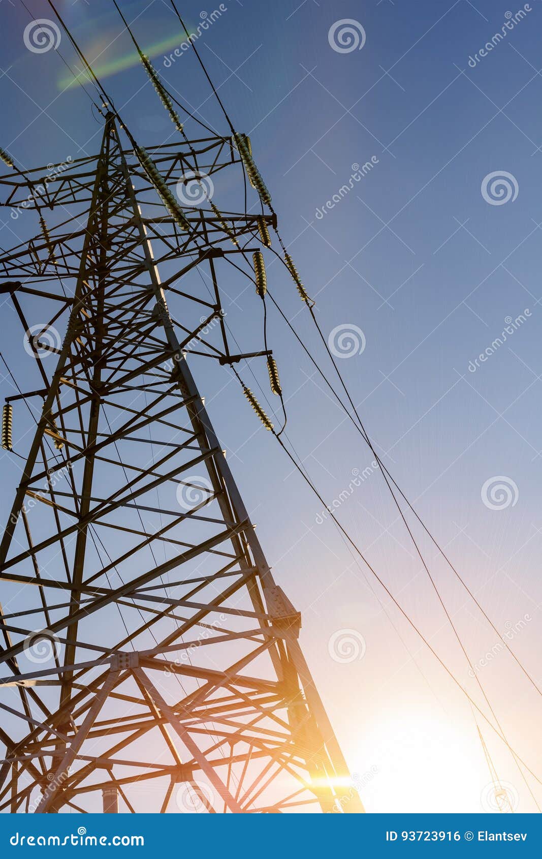 A Huge Pylon Against Blue Sky and Sun Rays. Stock Photo - Image of grid ...