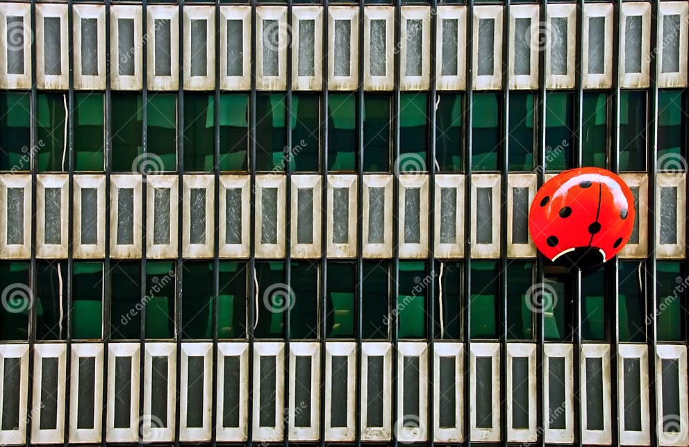 Huge Red Ladybug on a Building Facade Stock Image - Image of daytime ...
