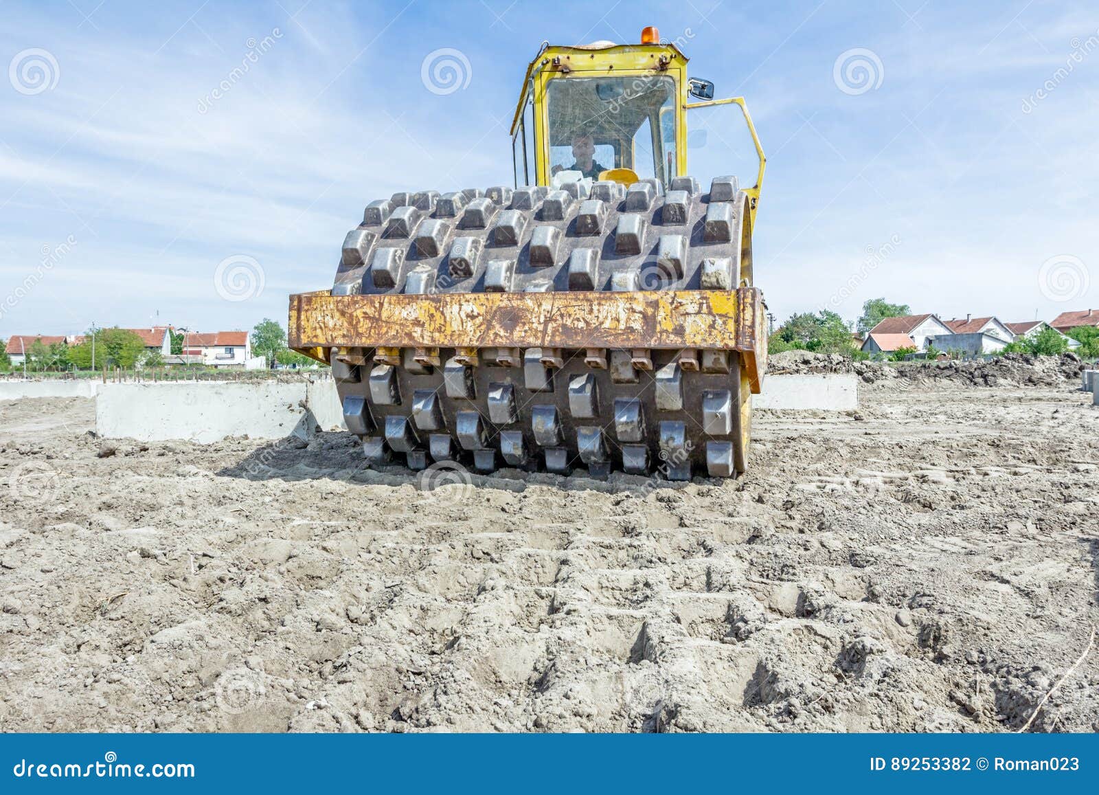 Huge Road Roller with Spikes is Compacting Soil at Construction Stock ...