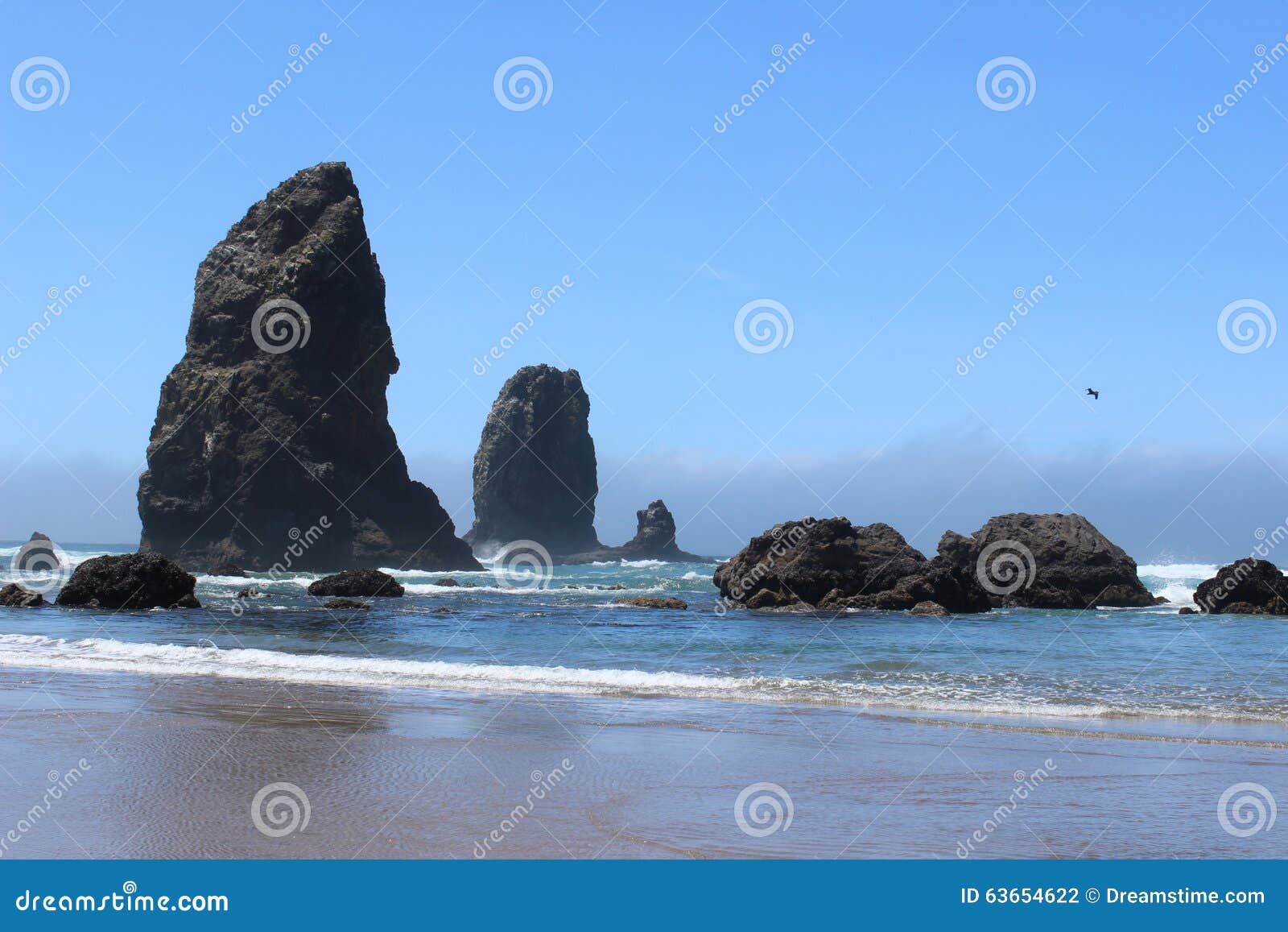 Huge rocks at ocean stock photo. Image of ocean, waves - 63654622