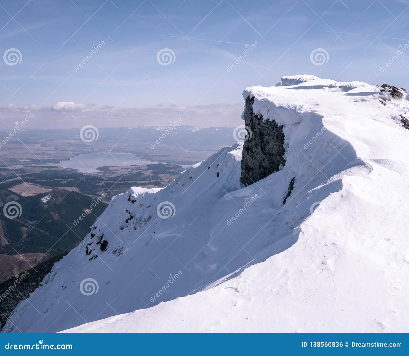 Amazing Rocky Edge with a Snow Overhang Stock Photo - Image of scenery ...
