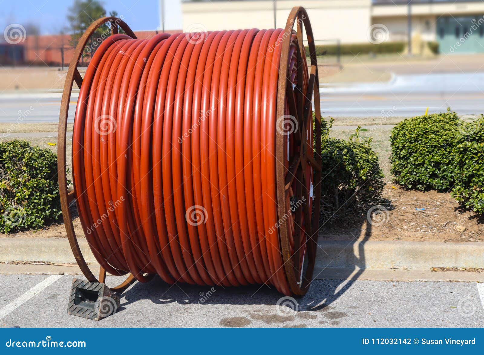 Huge Roll of Orange Cable for Underground Cable Installation Sitting ...