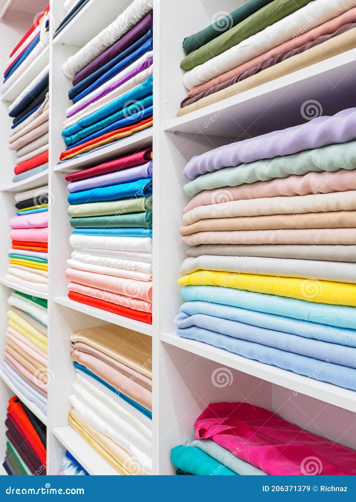 A Huge Selection of Different Bright and Beautiful Fabrics on White ...