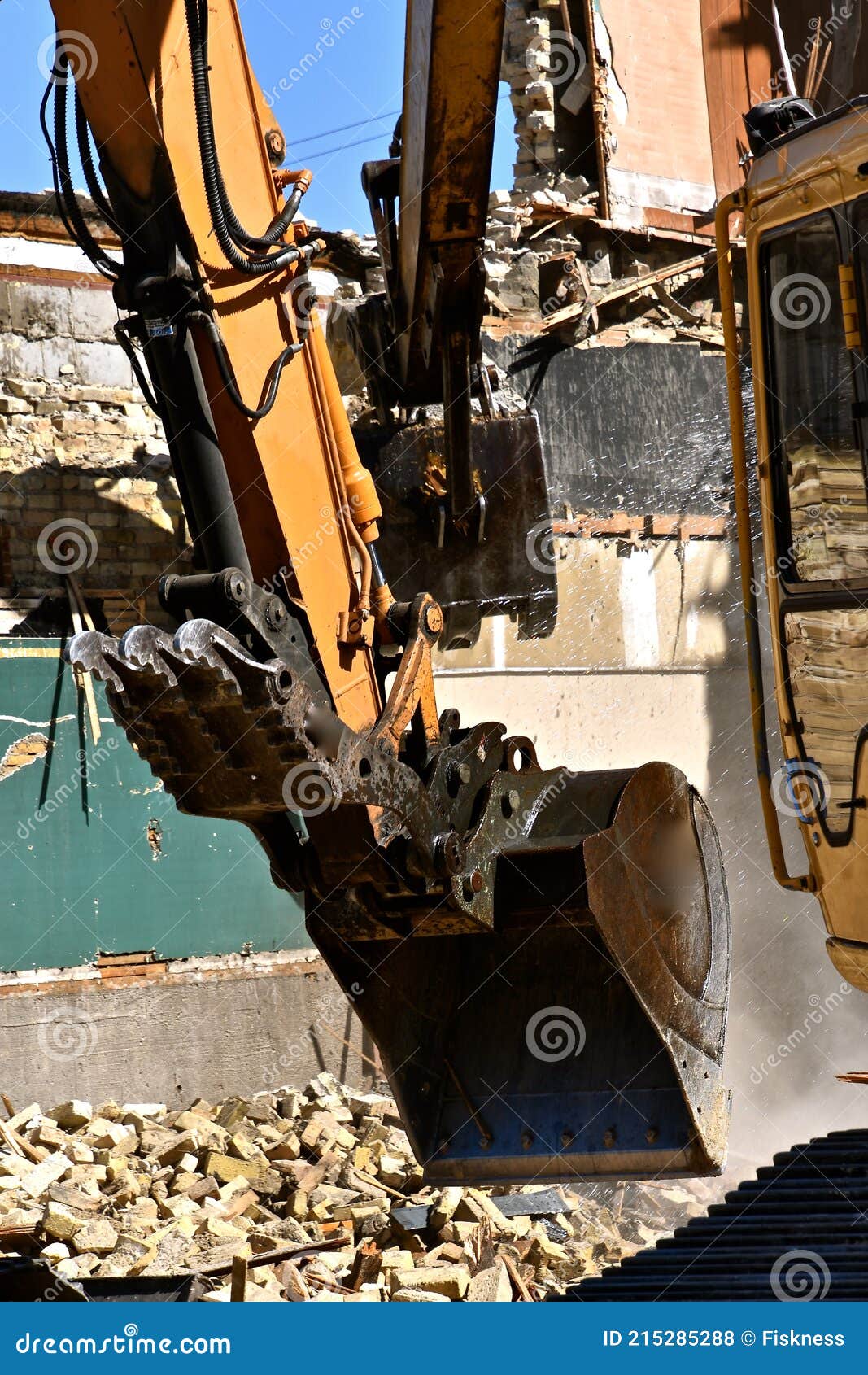 Backhoe Shovel Scooping Old Bricks Stock Photo - Image of blade ...