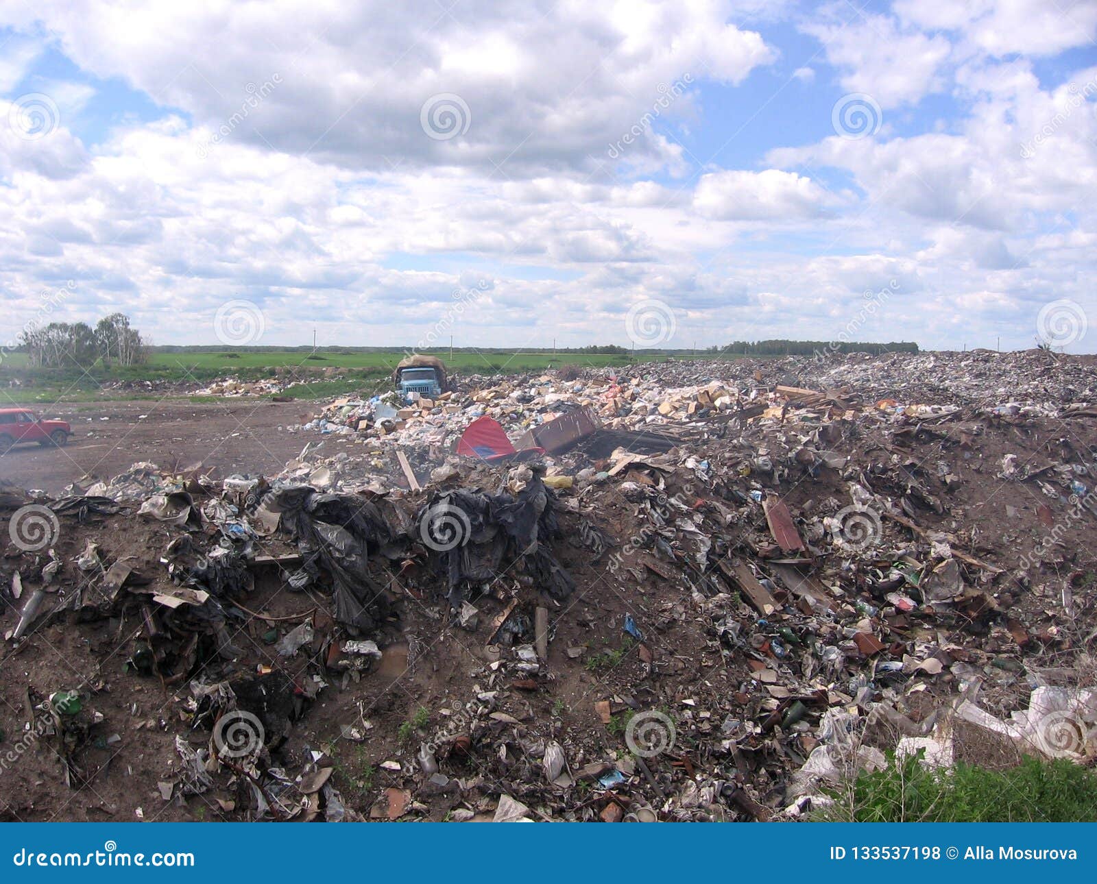 A Huge Stinking Dump of Garbage on the Ground Under the Open Sky Stock ...