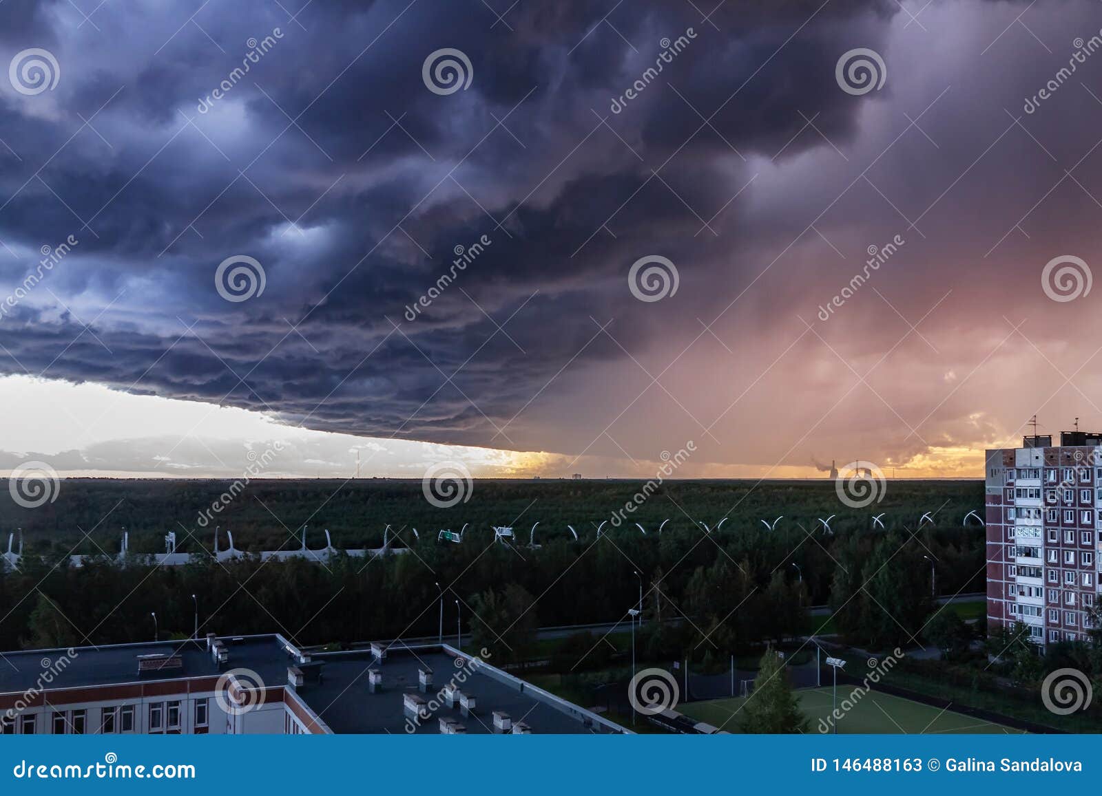 Huge Thundercloud Over A Wheat Field And Electric Pylons Royalty-Free ...