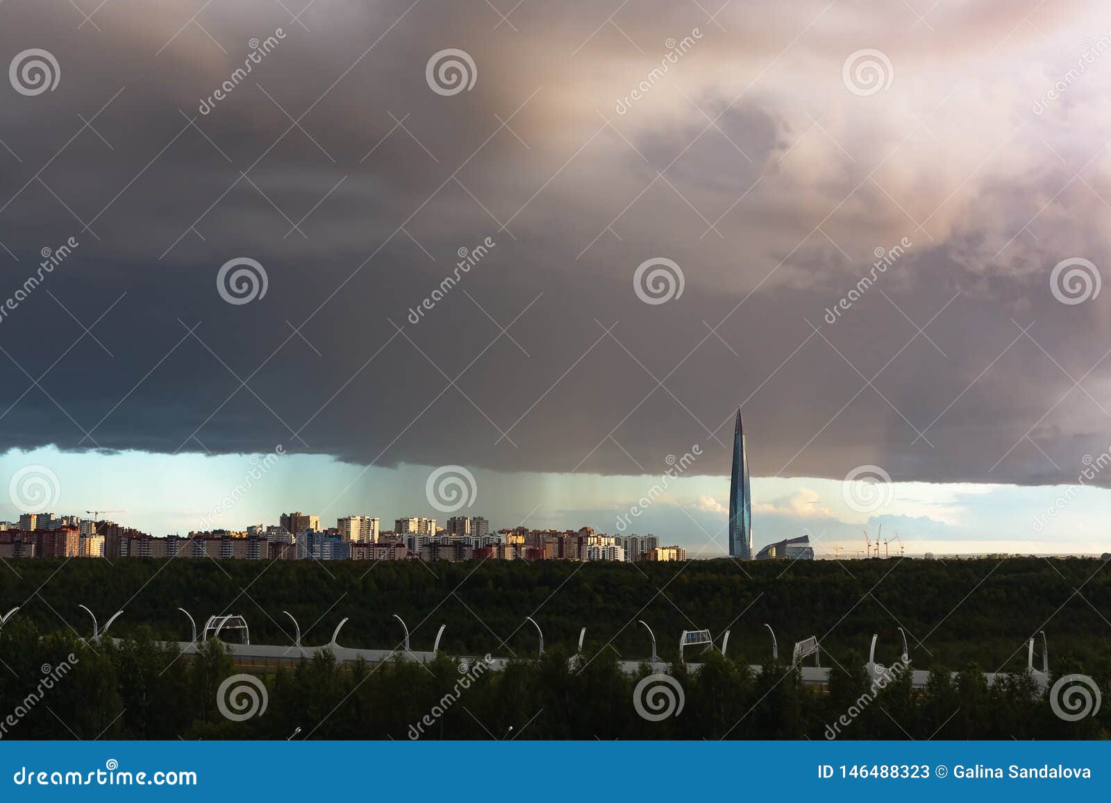 Huge Thundercloud Over A Wheat Field And Electric Pylons Royalty-Free ...