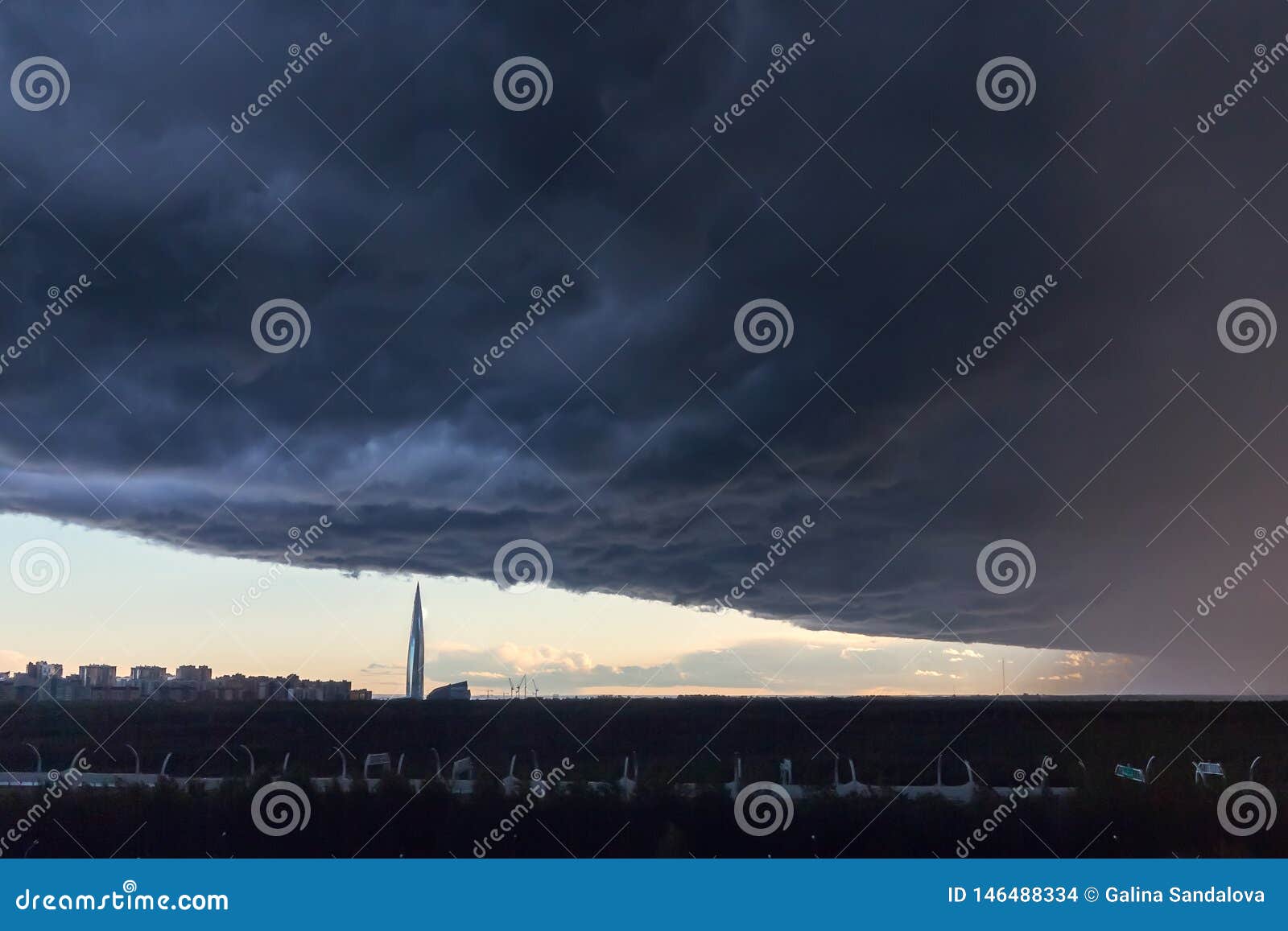Huge Thundercloud Over A Wheat Field And Electric Pylons Royalty-Free ...