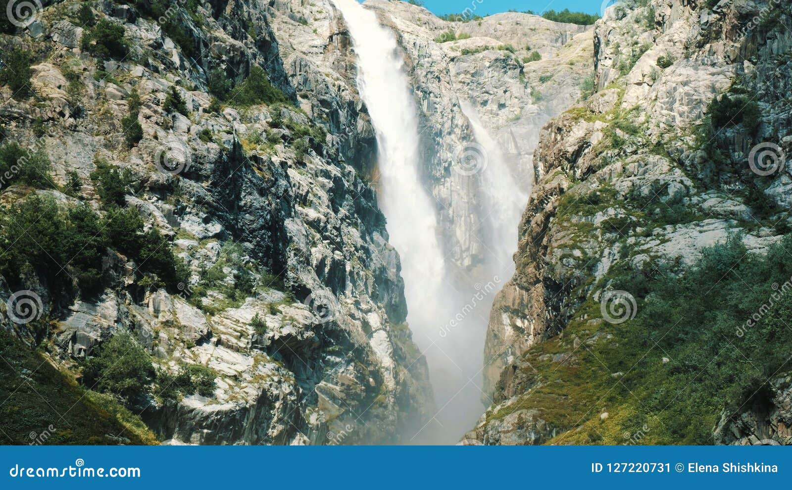 Huge Waterfall in the Mountains, a Powerful Stream of Water Falls from ...