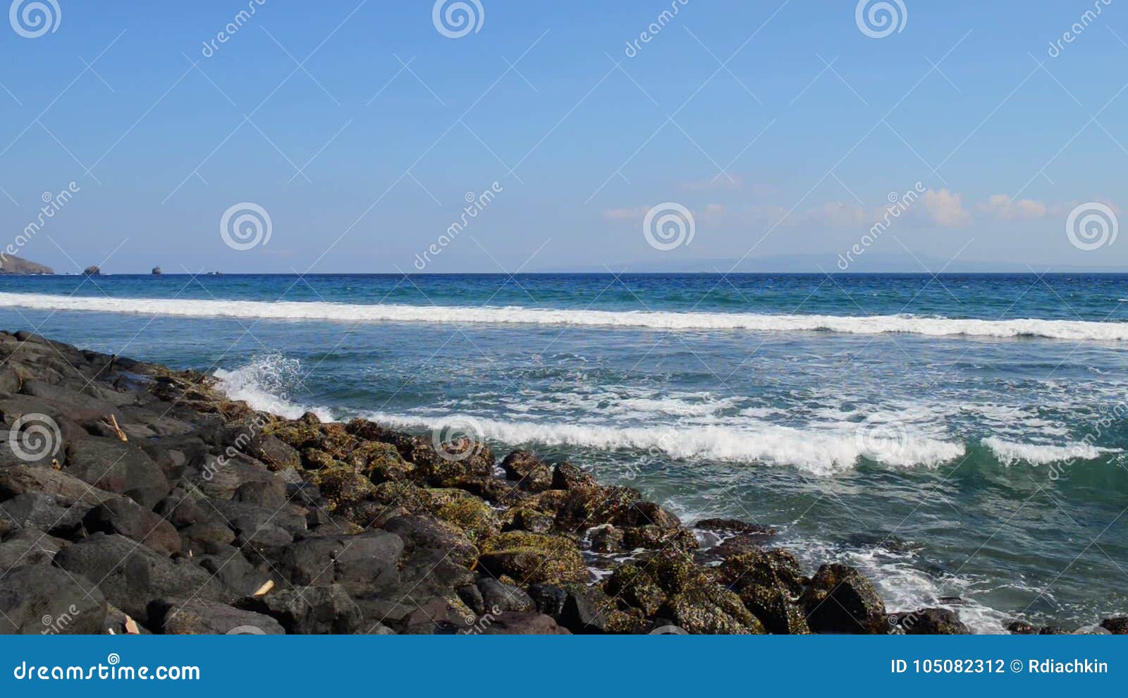 A Huge Wave Hits the Rocks. Waves Hitting Rocks on a Tropical Beach ...