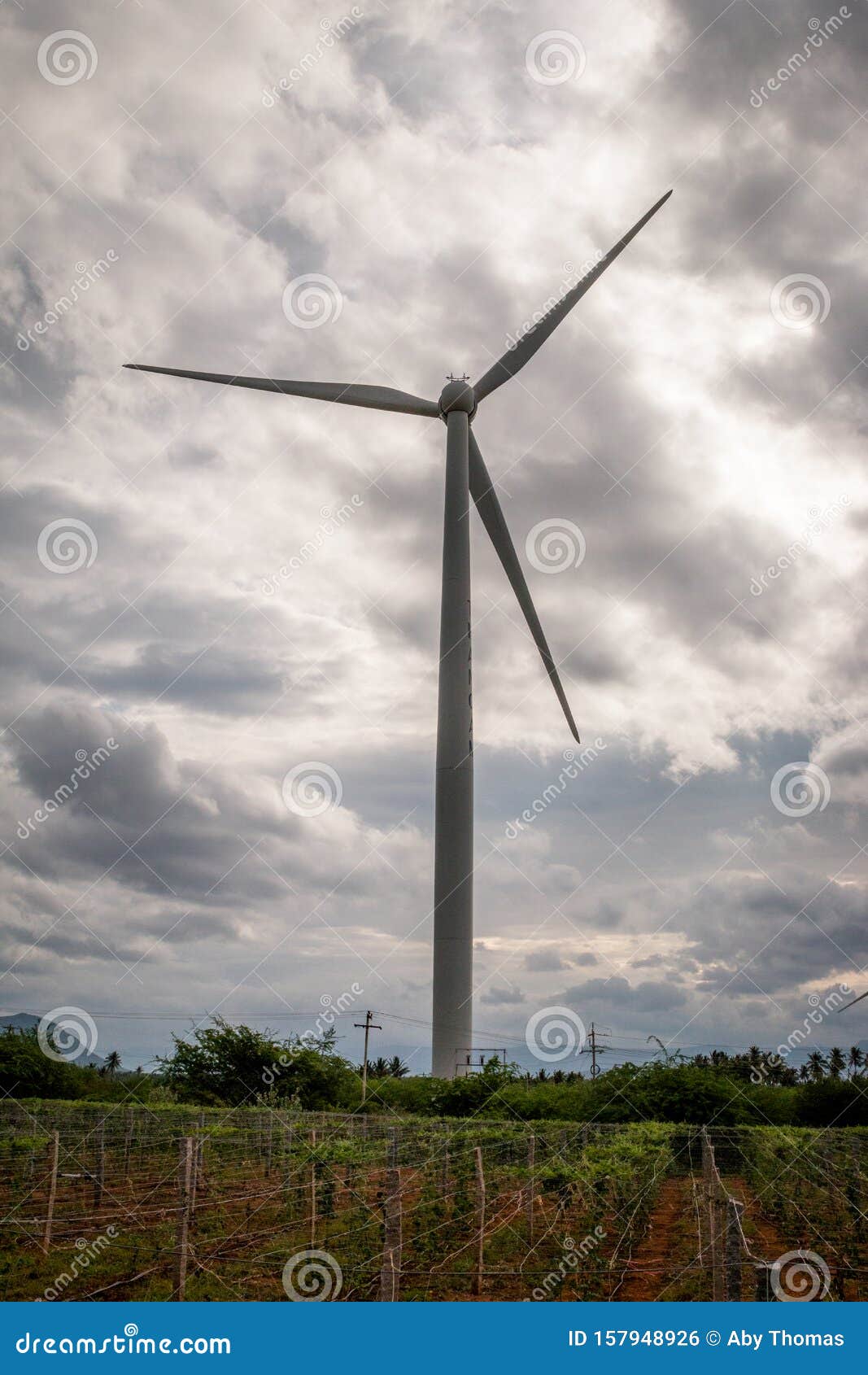 Windmill with Cloudy Background Editorial Photo - Image of green, rural ...