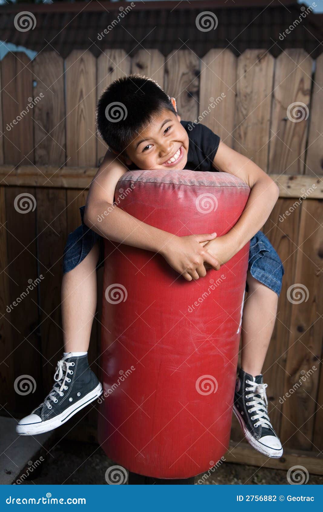 Hugging a bag stock photo. Image of lifestyle, climb, tshirt - 2756882