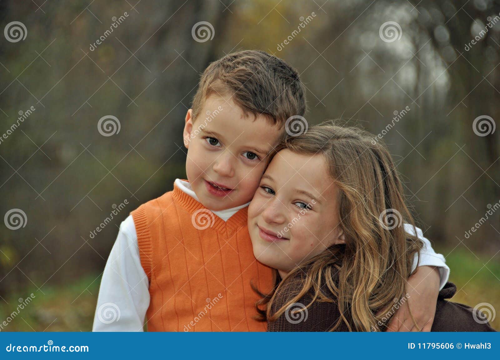Hugging in fall stock photo. Image of outside, children - 11795606