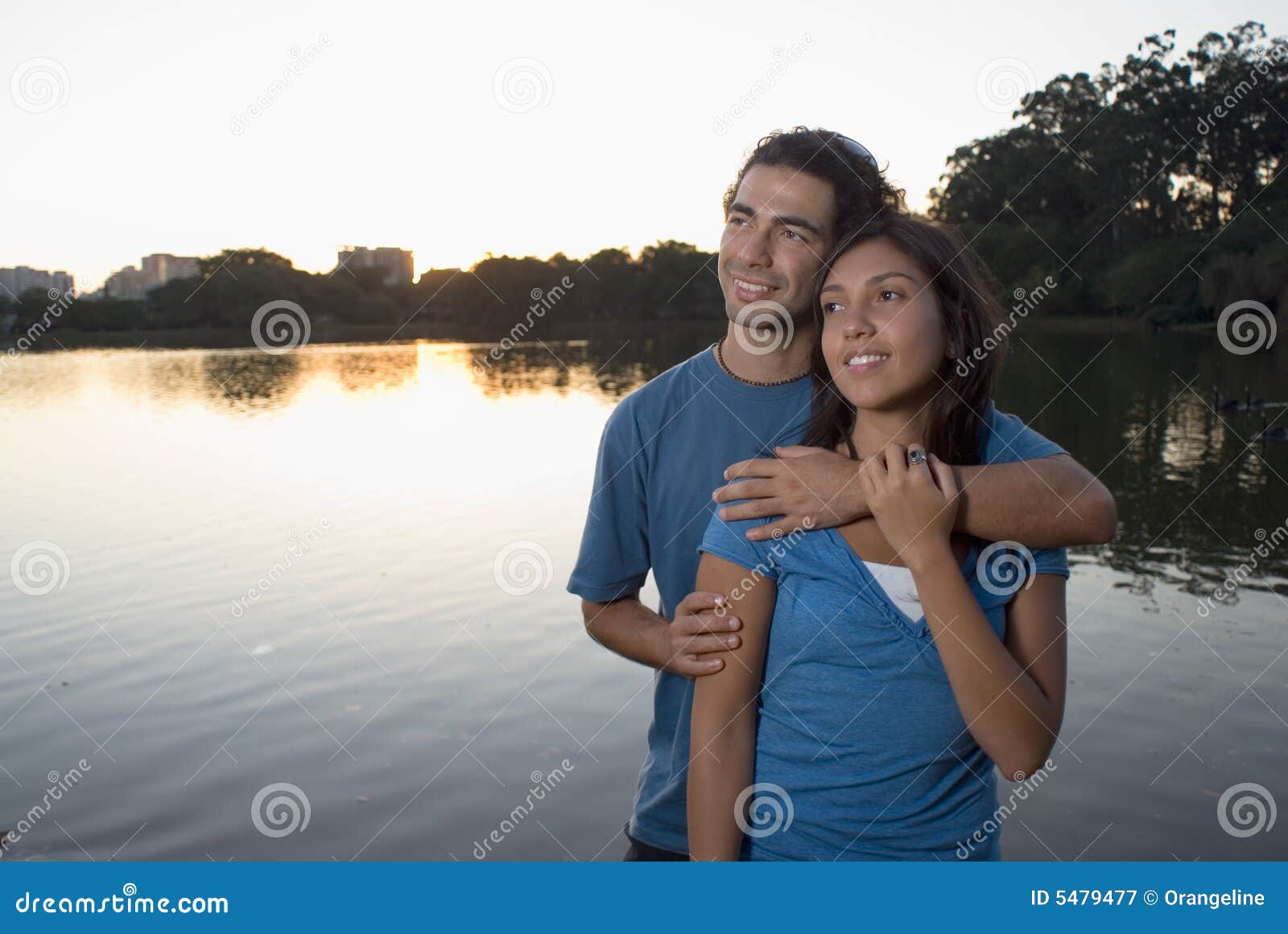 Hugging by a Pond. - Horizontal Stock Image - Image of affection ...