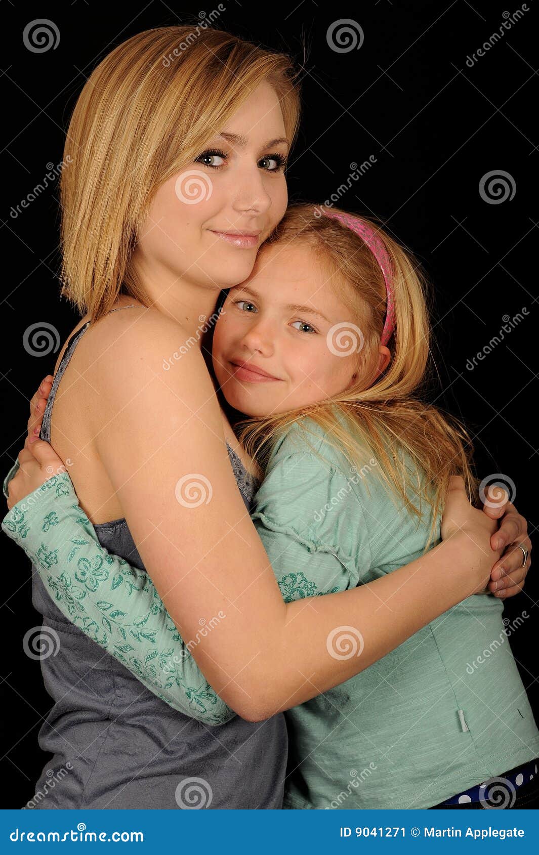 Hugging Sisters stock image. Image of blond, smile, happy - 9041271