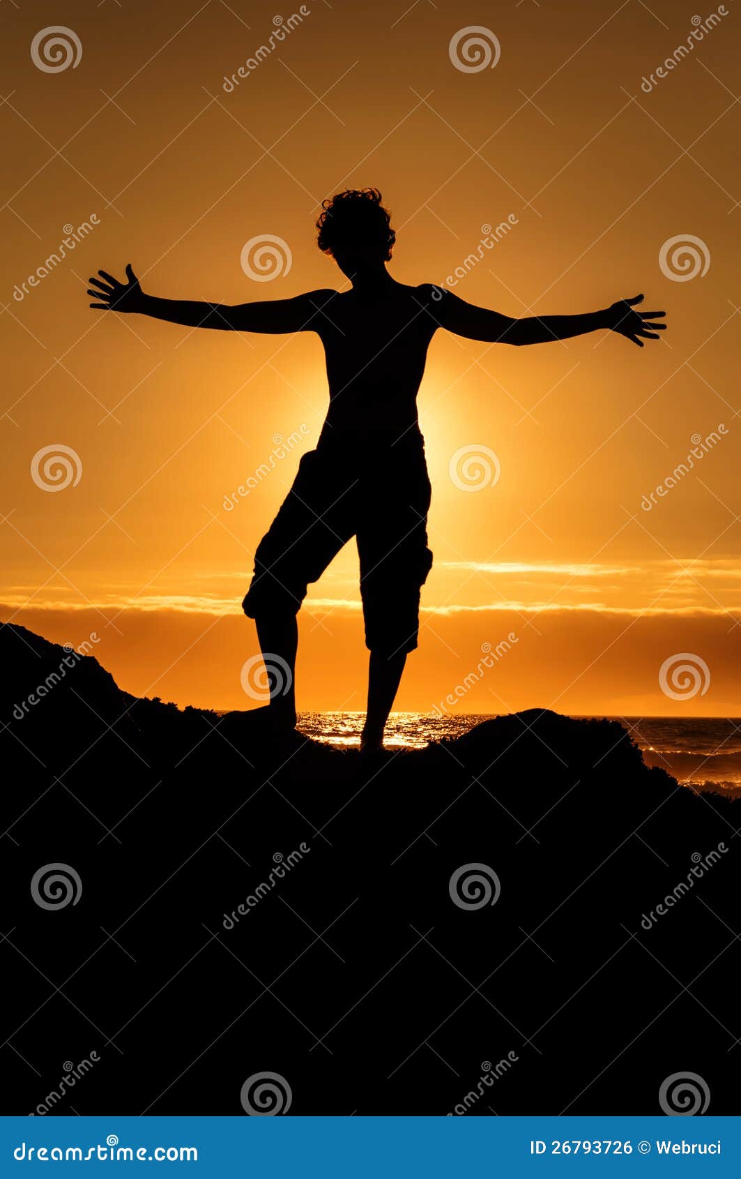 Hugging the sunset. stock photo. Image of action, meditating - 26793726