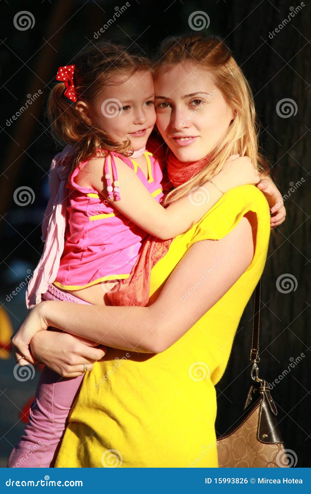 Hugging in warm light stock photo. Image of family, warm - 15993826