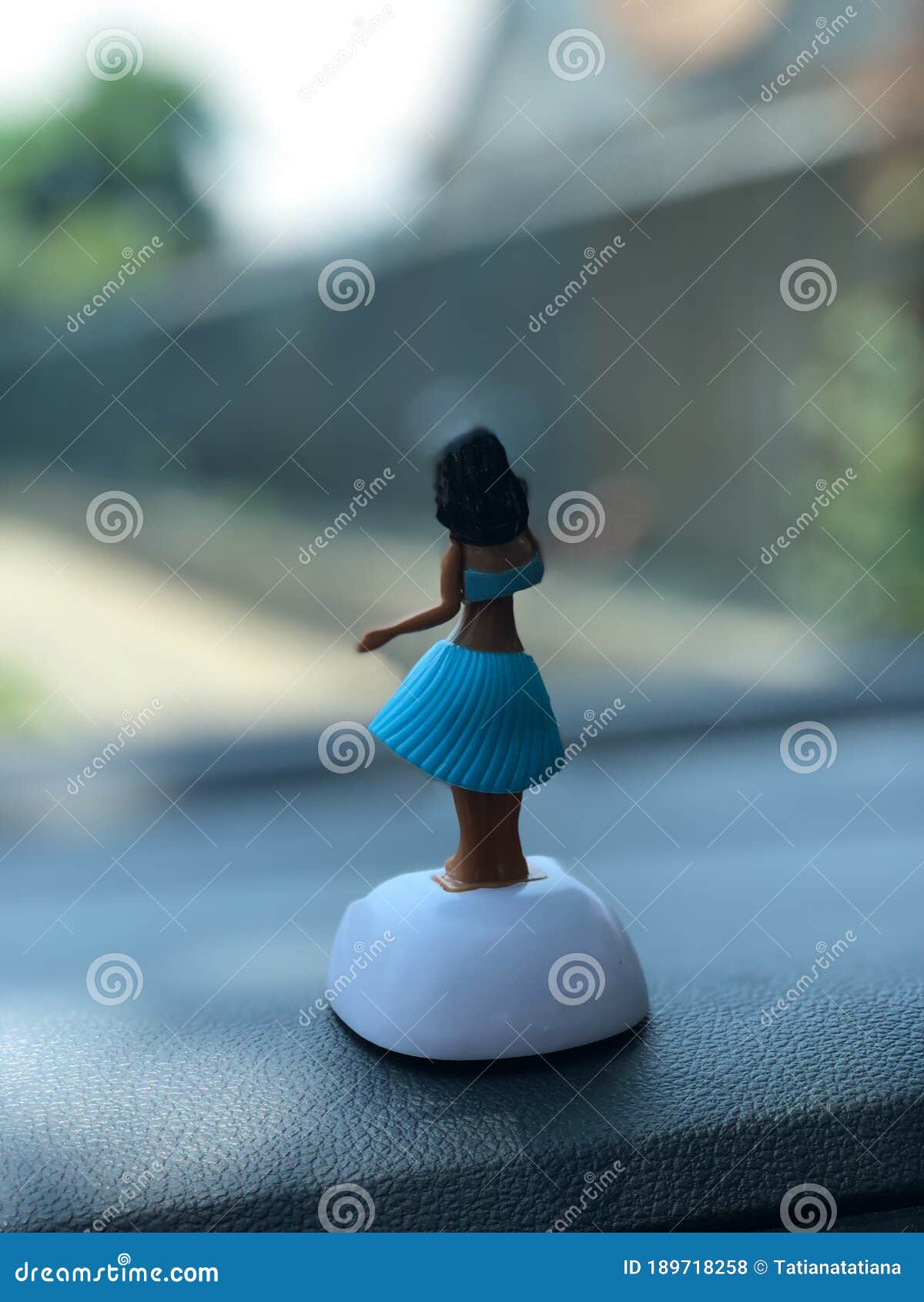 Hula Dancer on Dashboard of Car Stock Photo - Image of dancer ...
