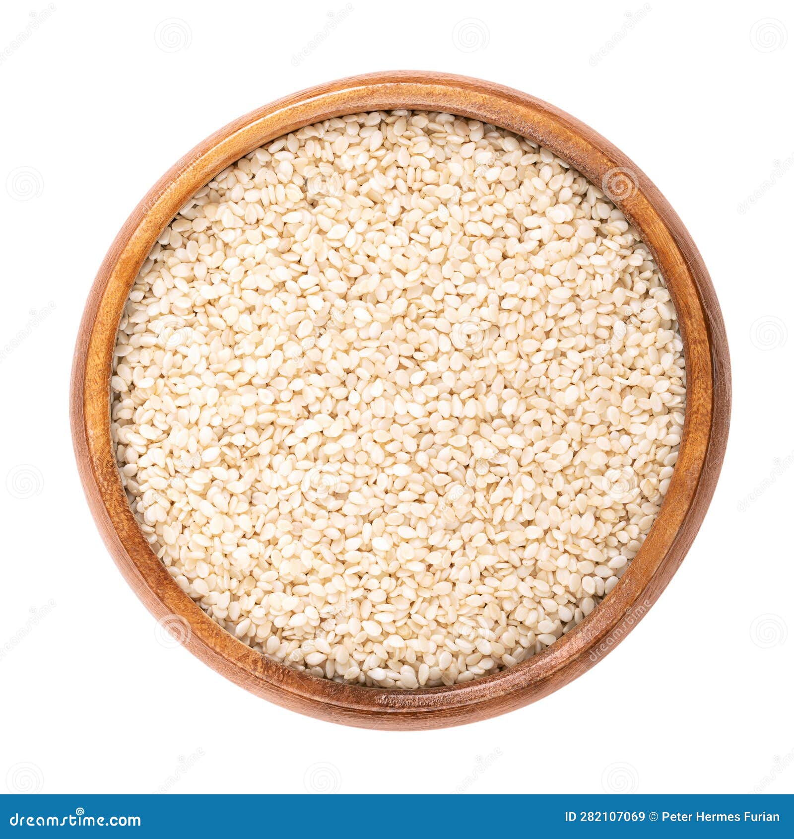 Hulled Sesame Seeds, White Sesame or Also Benne, in a Wooden Bowl Stock ...