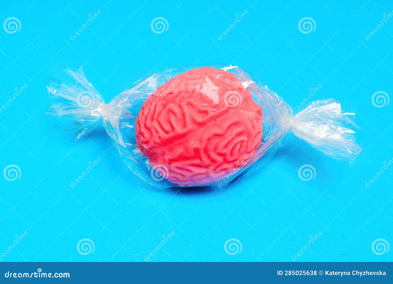 Human Brain Wrapped in Plastic on Blue Stock Photo - Image of studio ...