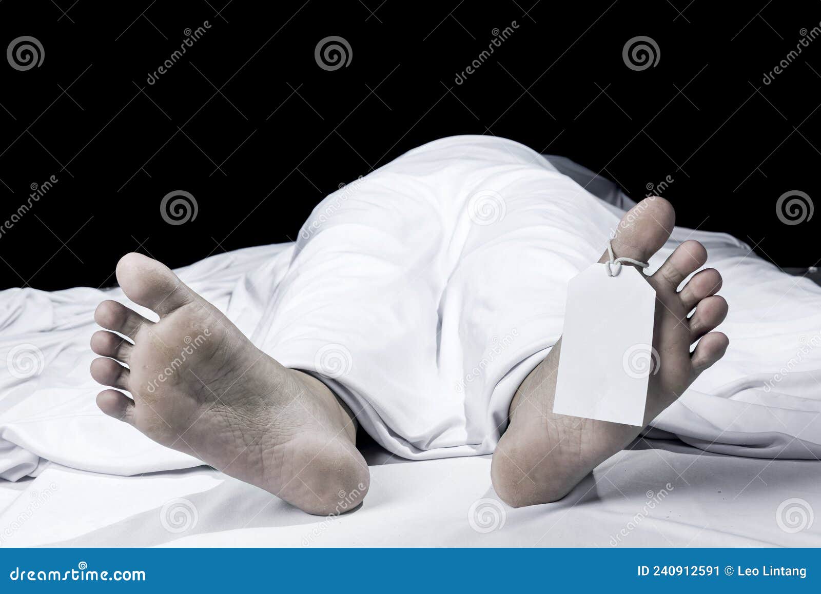 Human Corpse Covered with a Sheet and Name Tag on Toe Stock Image ...