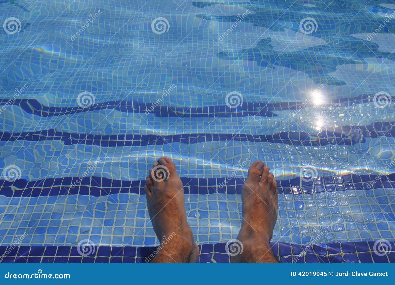Human feet in a pool stock image. Image of foot, woman - 42919945