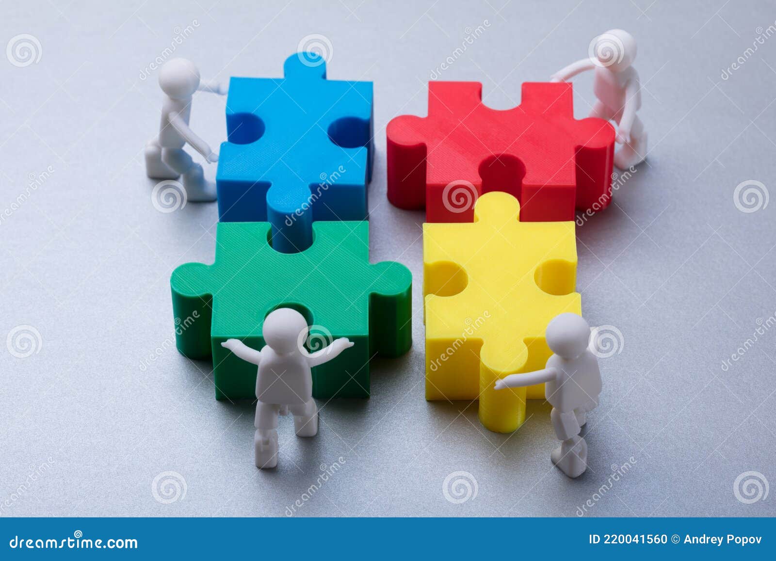 Human Figures Solving Jigsaw Puzzle Stock Photo - Image of figure ...