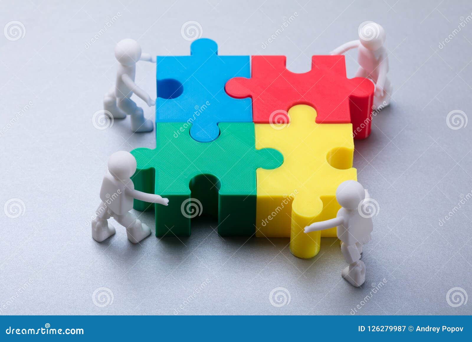 Human Figures Solving Jigsaw Puzzle Stock Image - Image of figure ...
