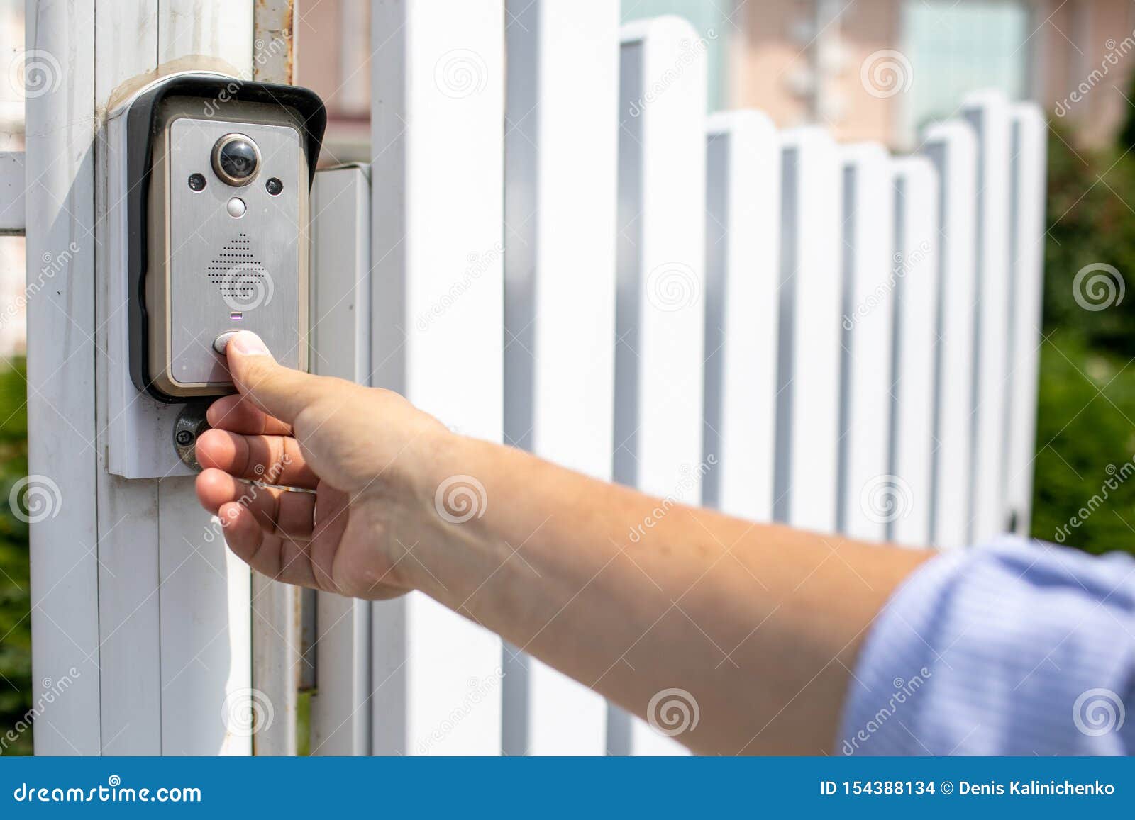 Human Finger Pushing Button of Video Intercom Equipment. Country House ...