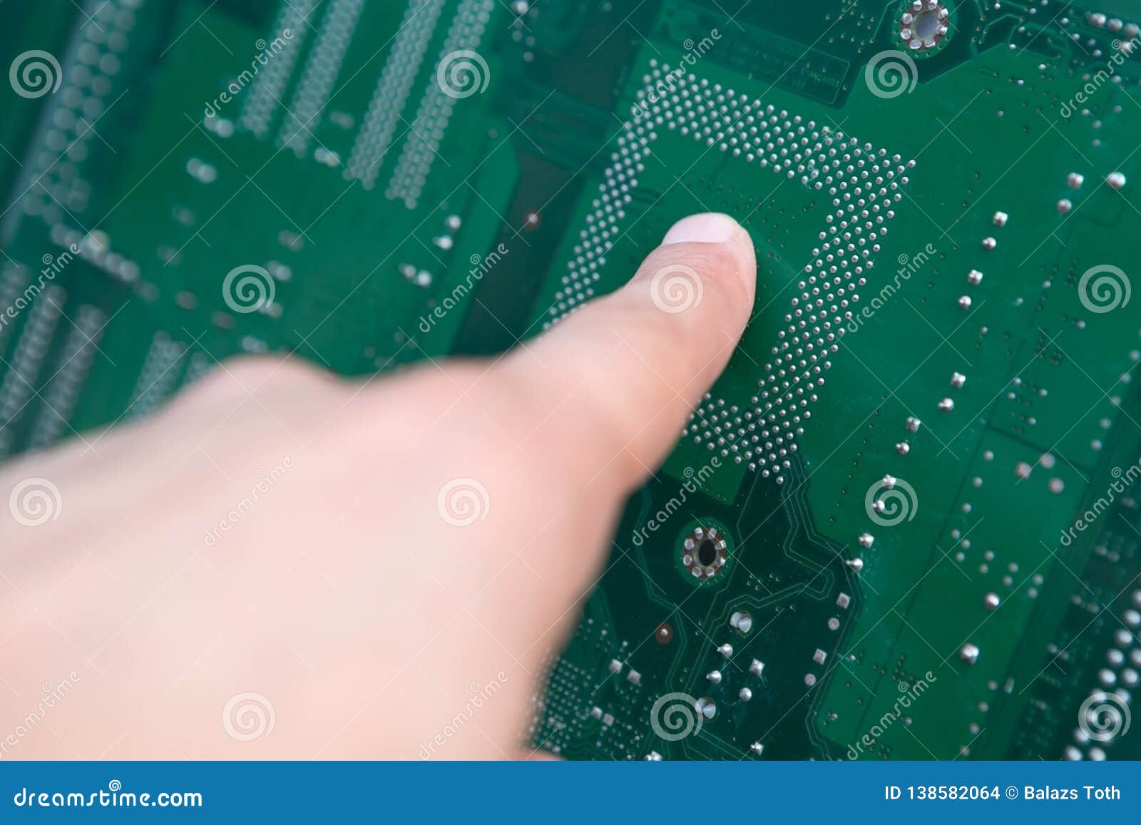 Human Finger Touching a Digital Motherboard Chip Stock Photo - Image of ...