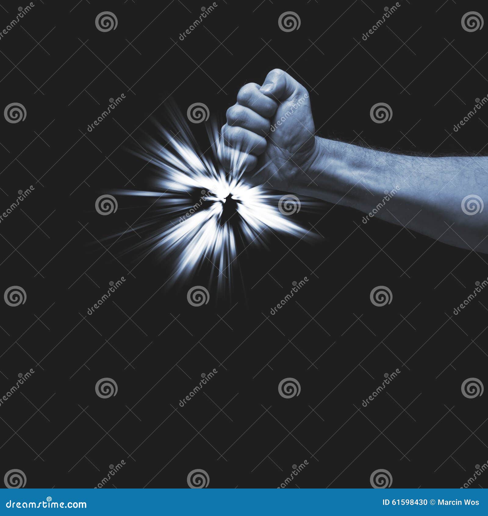 Human Fist with Light Under Hand on Black Background Stock Photo ...