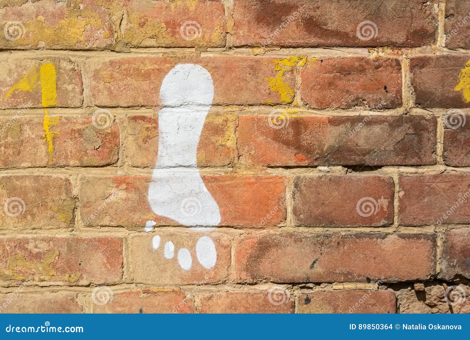 Human Footprint on Brick Wall Stock Photo - Image of imprint, december ...