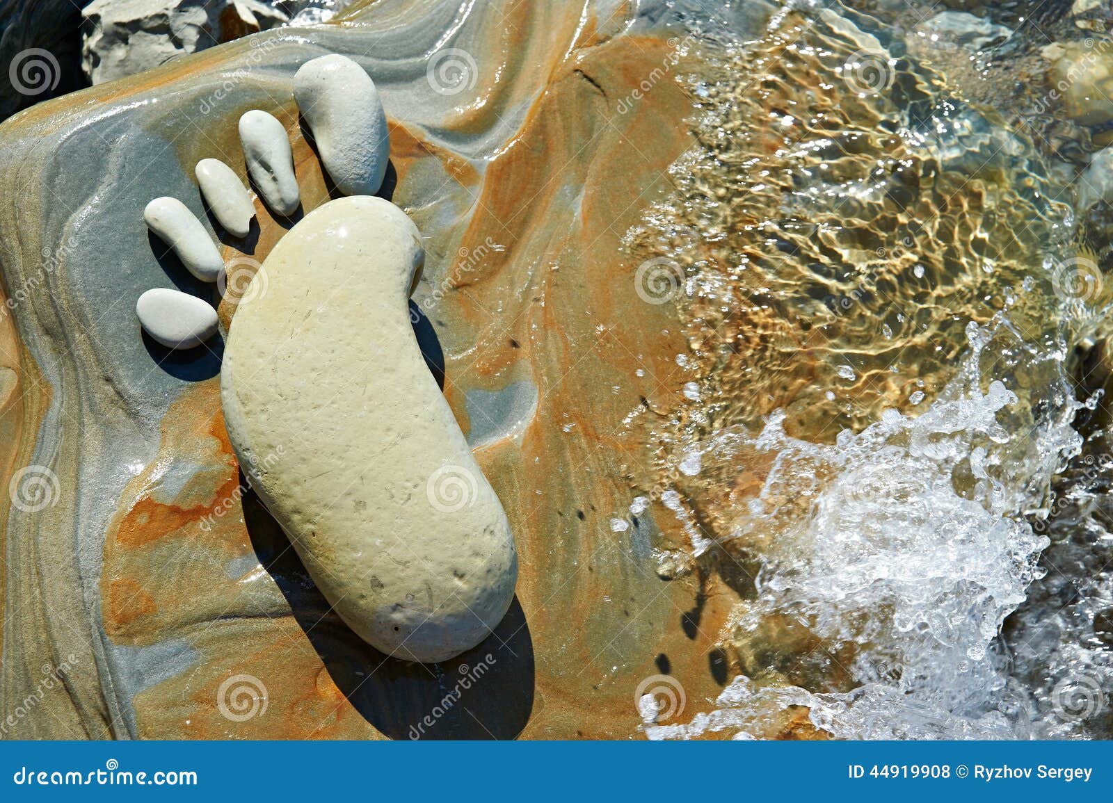 Human footprint in stone stock photo. Image of foot, life - 44919908