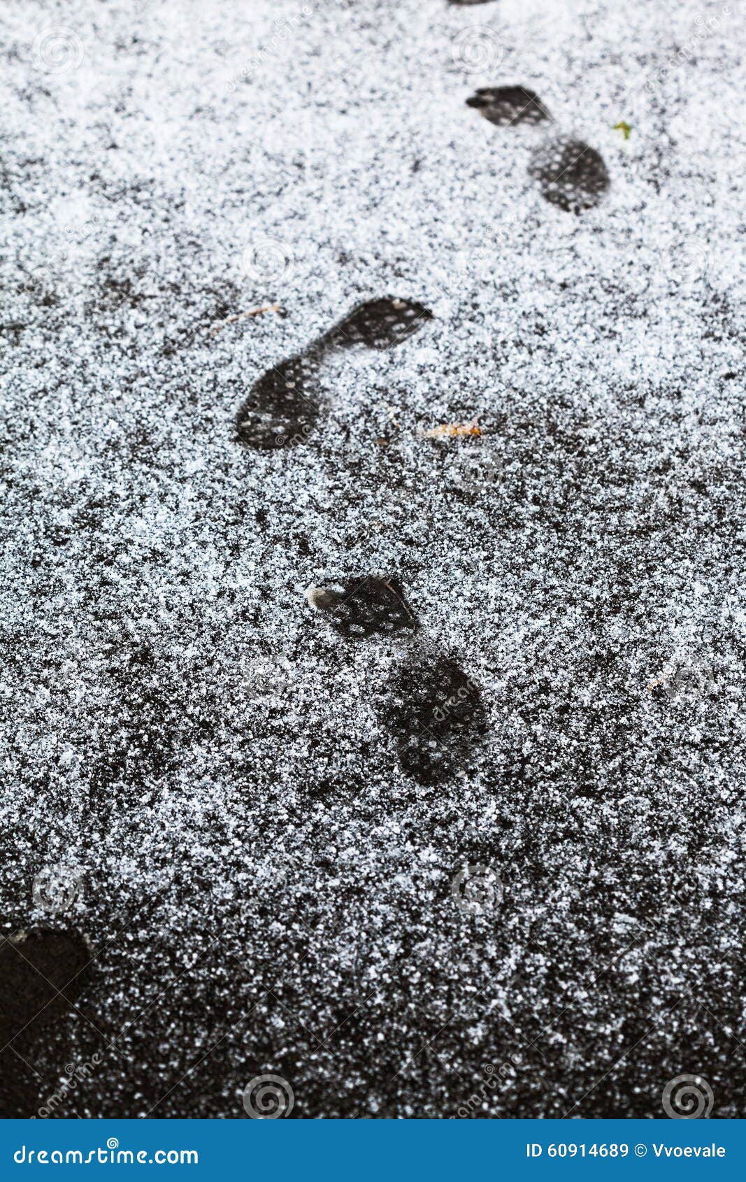 Human Footprints on Sidewalk Covered by First Snow Stock Image - Image ...