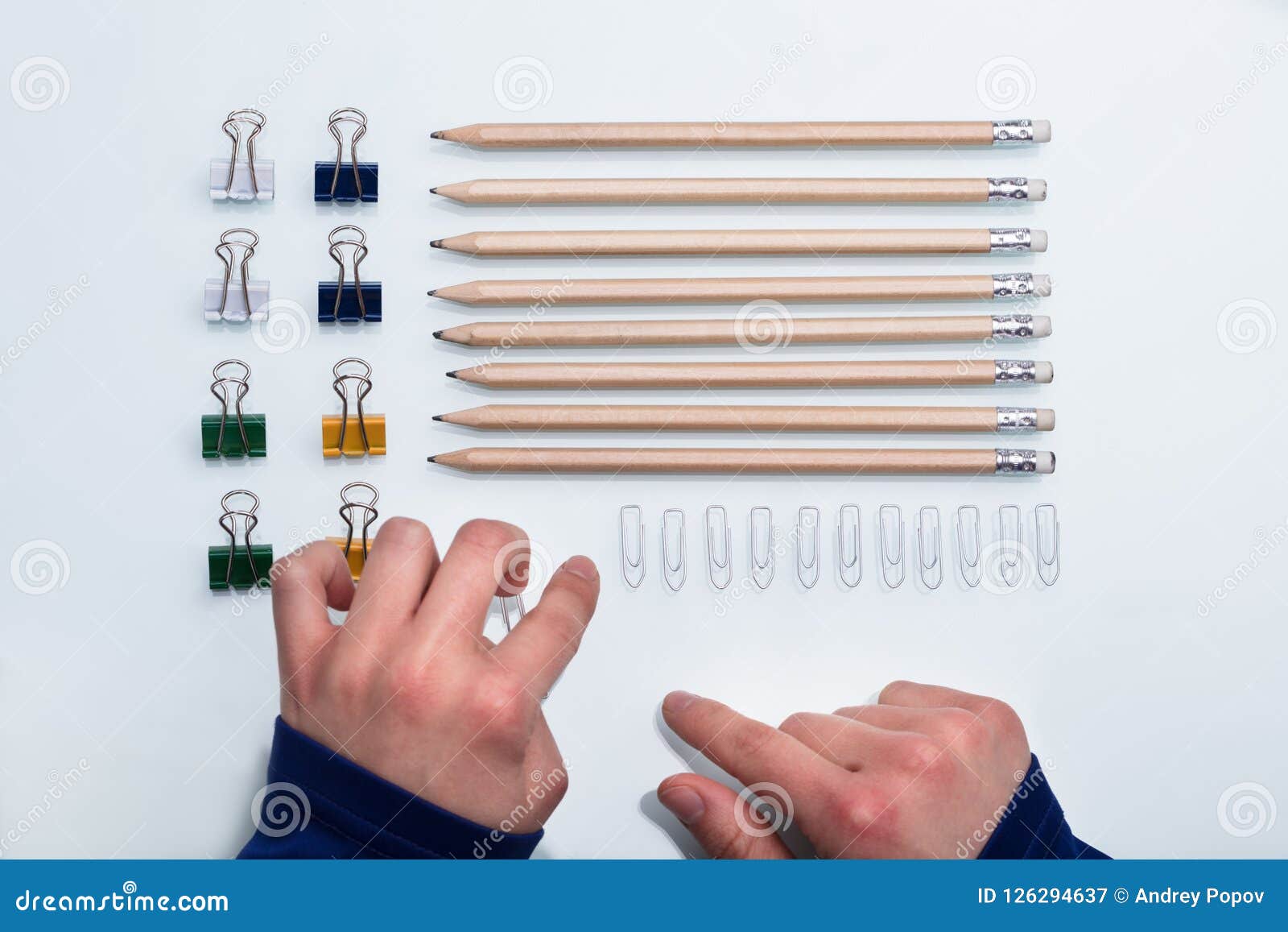 Human Hand Arranging Office Supplies Stock Image - Image of clip ...