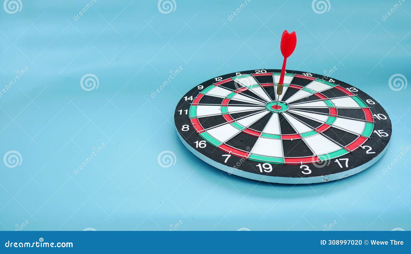 The Human Hand and Arrow Hit the Center of the Target Board. Stock ...