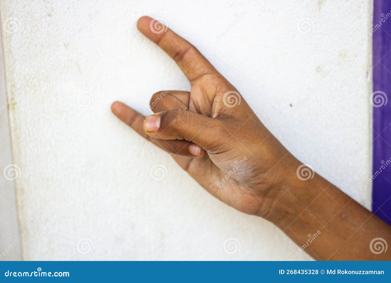 It is a Human Hand and the Background is White and Blurred Stock Photo ...