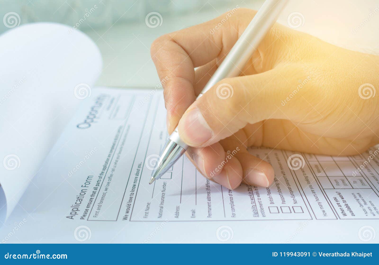 Human Hand with Ballpoint Pen Over Application Form Stock Image - Image ...