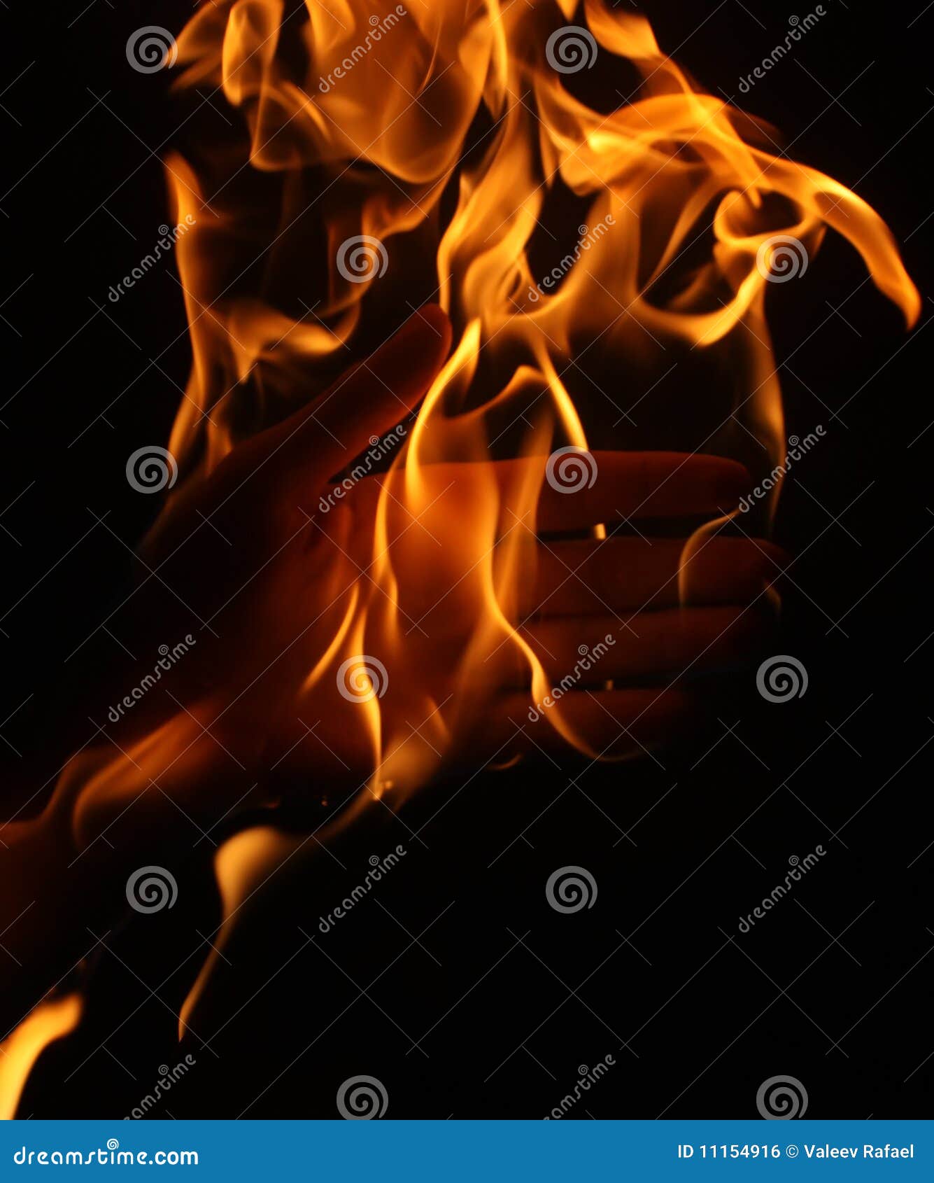 Human hand being in flame stock photo. Image of background - 11154916