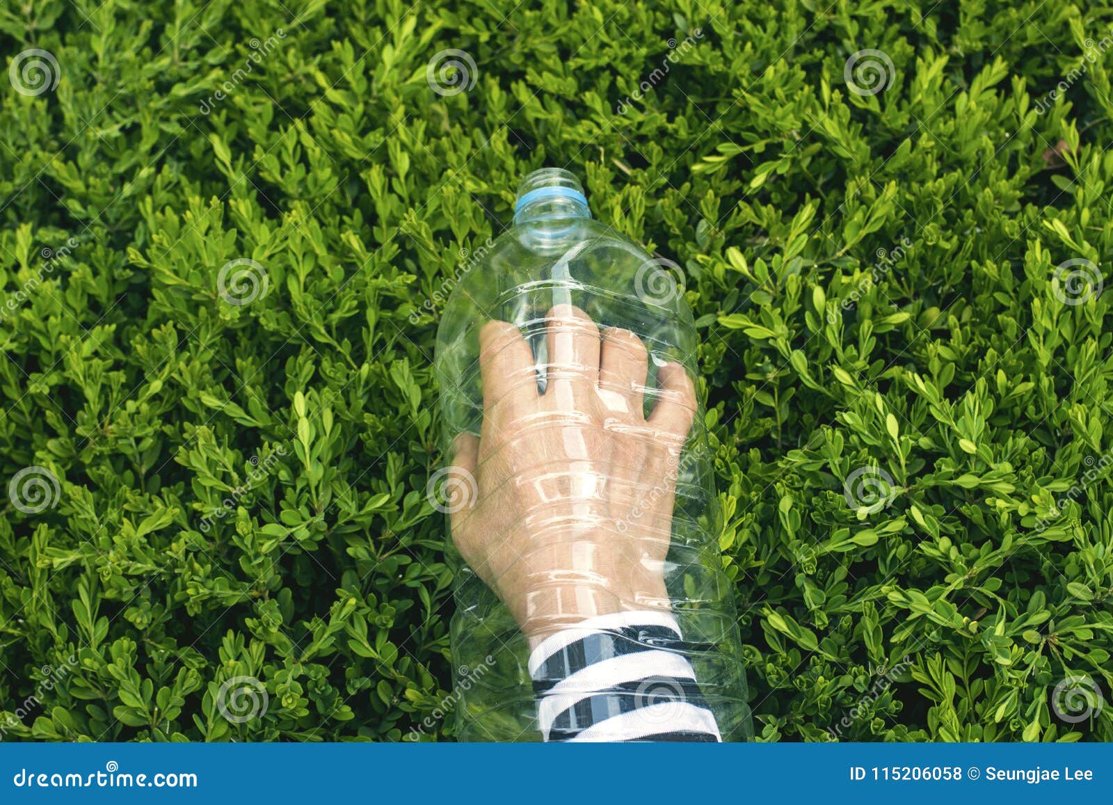 Human Hand in Empty Plastic Bottle. Stock Photo - Image of ...