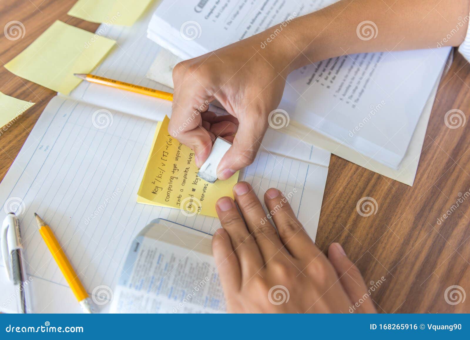 Human Hand Erase Some Characters on Sticky Note Stock Photo - Image of ...