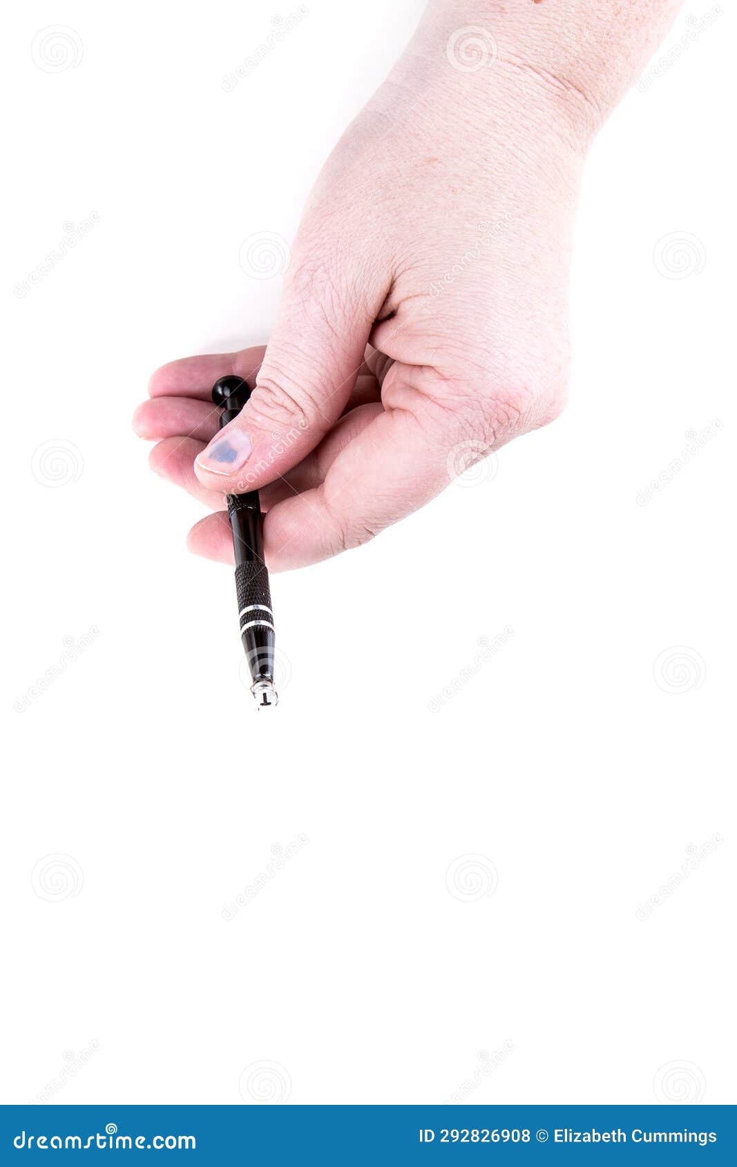 Human Hand Grasping a Bead with a Wire Grabber Tool Stock Photo - Image ...