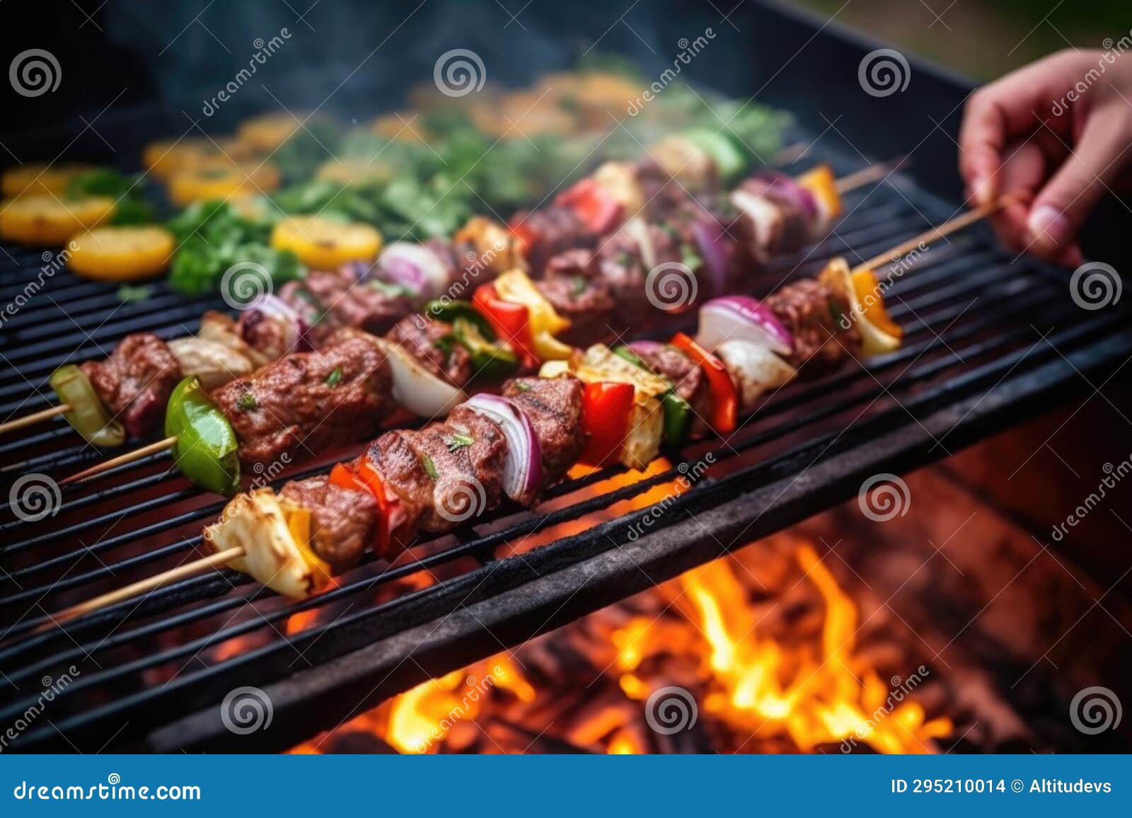Human Hand Grilling a Bunch of Mediterranean Kebabs Stock Photo - Image ...