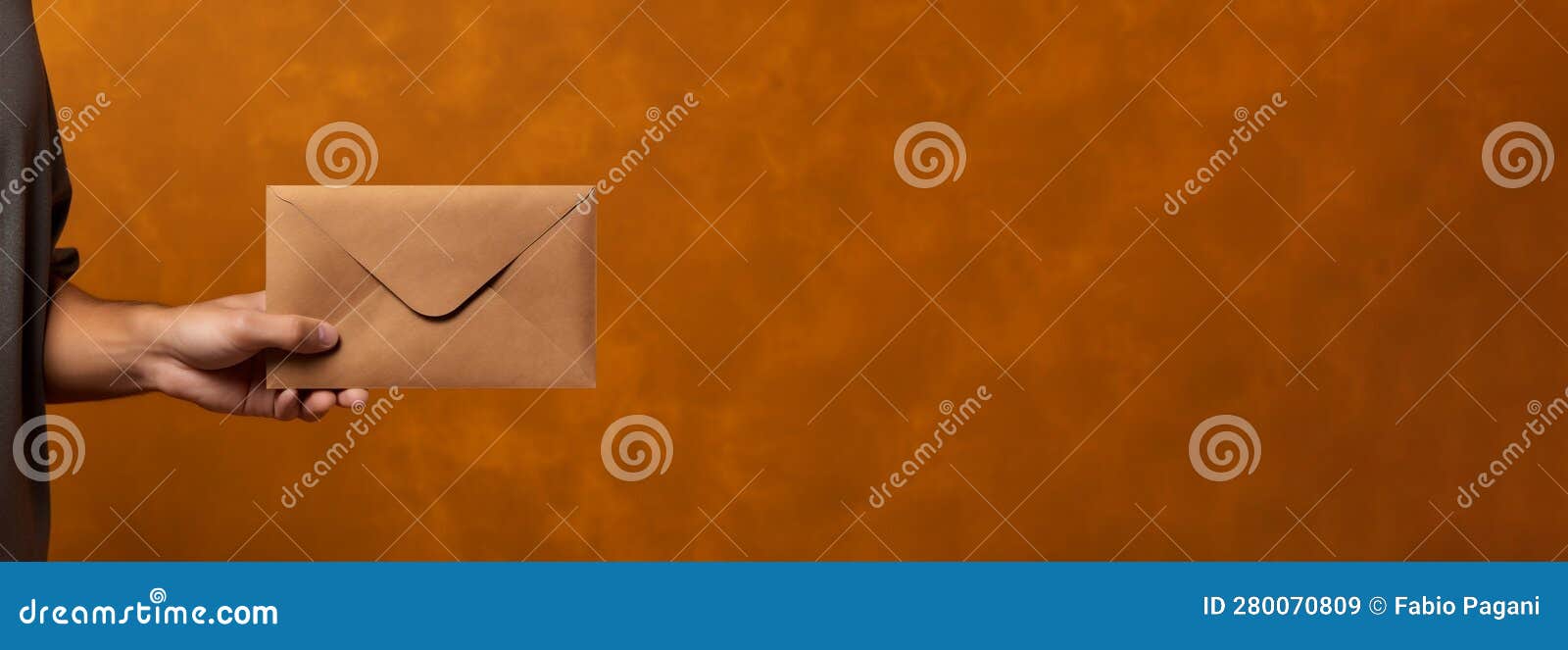 Human Hand Holding Blank Brown Envelope, Mail and Delivery Concept ...