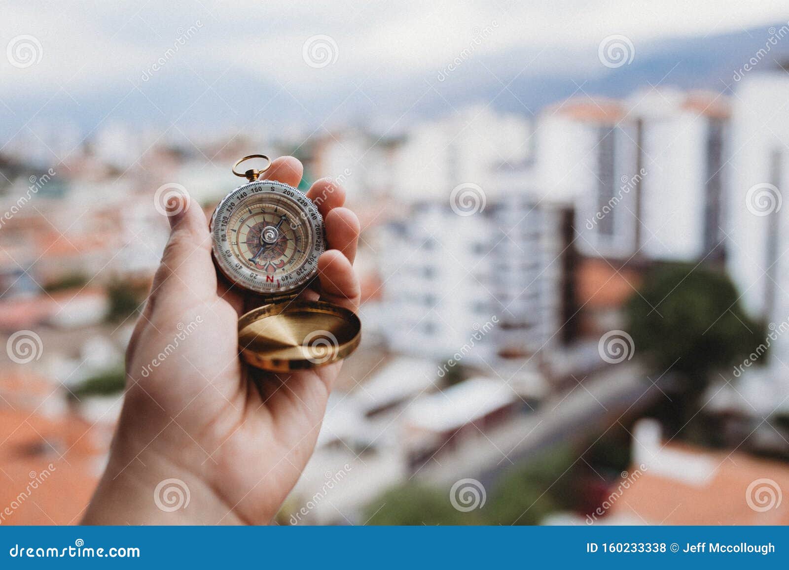A Human Hand Holding a Compass Stock Photo - Image of compass, america ...