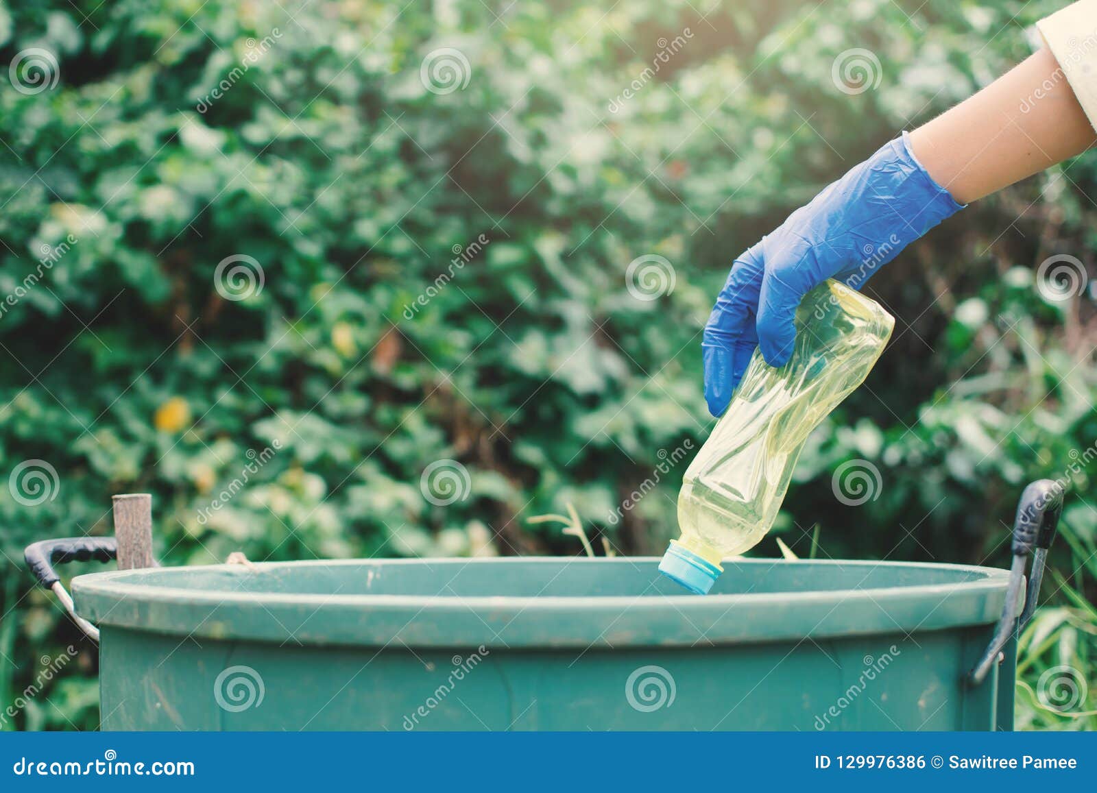 Human Hand Holding Empty Bottle Plastic Garbage in To Trash Stock Photo ...