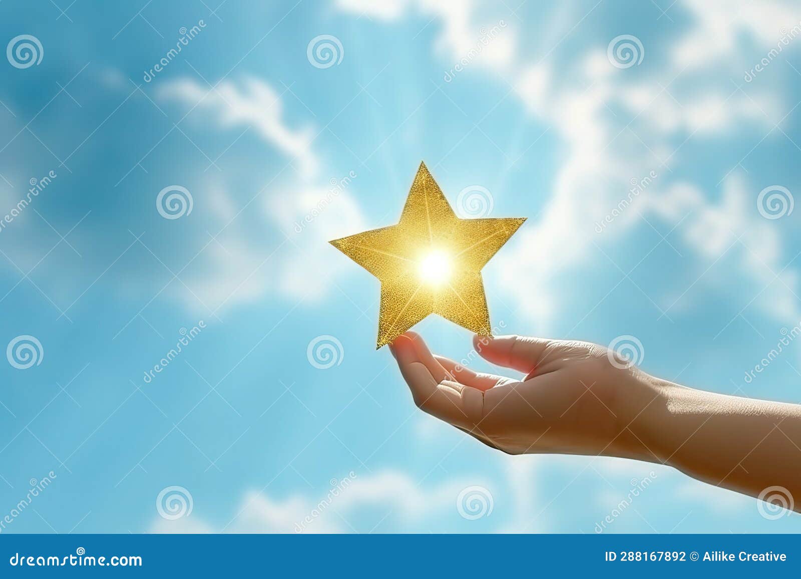 Human Hand Holding a Golden Star on the Background of the Blue Sky ...