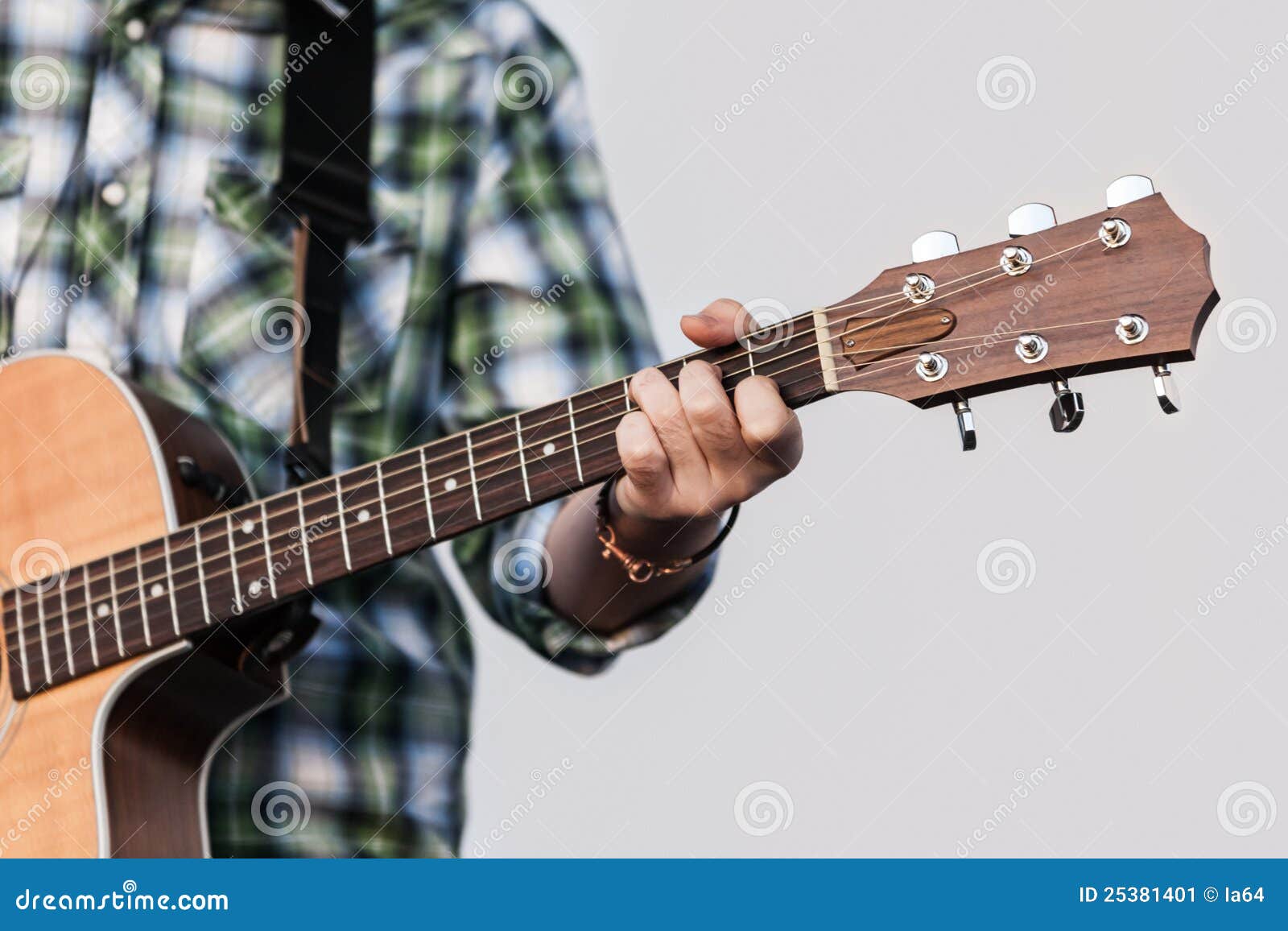 Human hand holding guitar stock image. Image of fretboard - 25381401